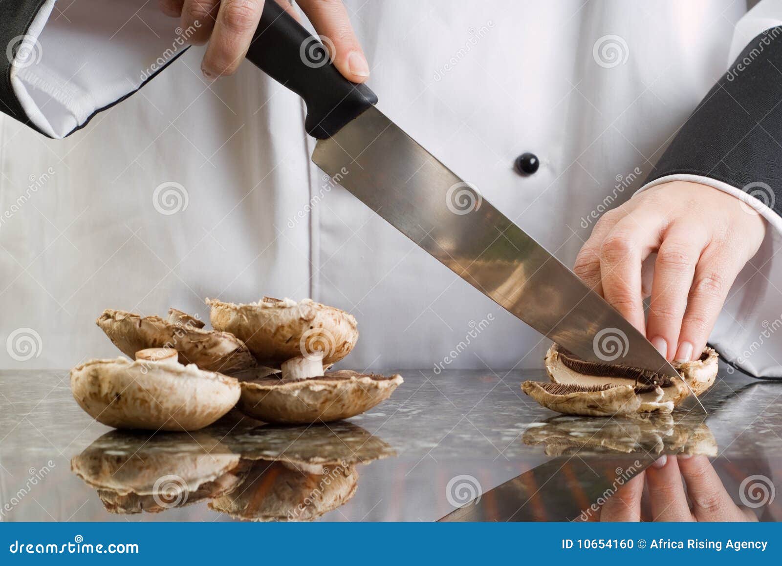 Chef Cutting Brown Mushrooms Stock Photo - Image of black, marble: 10654160