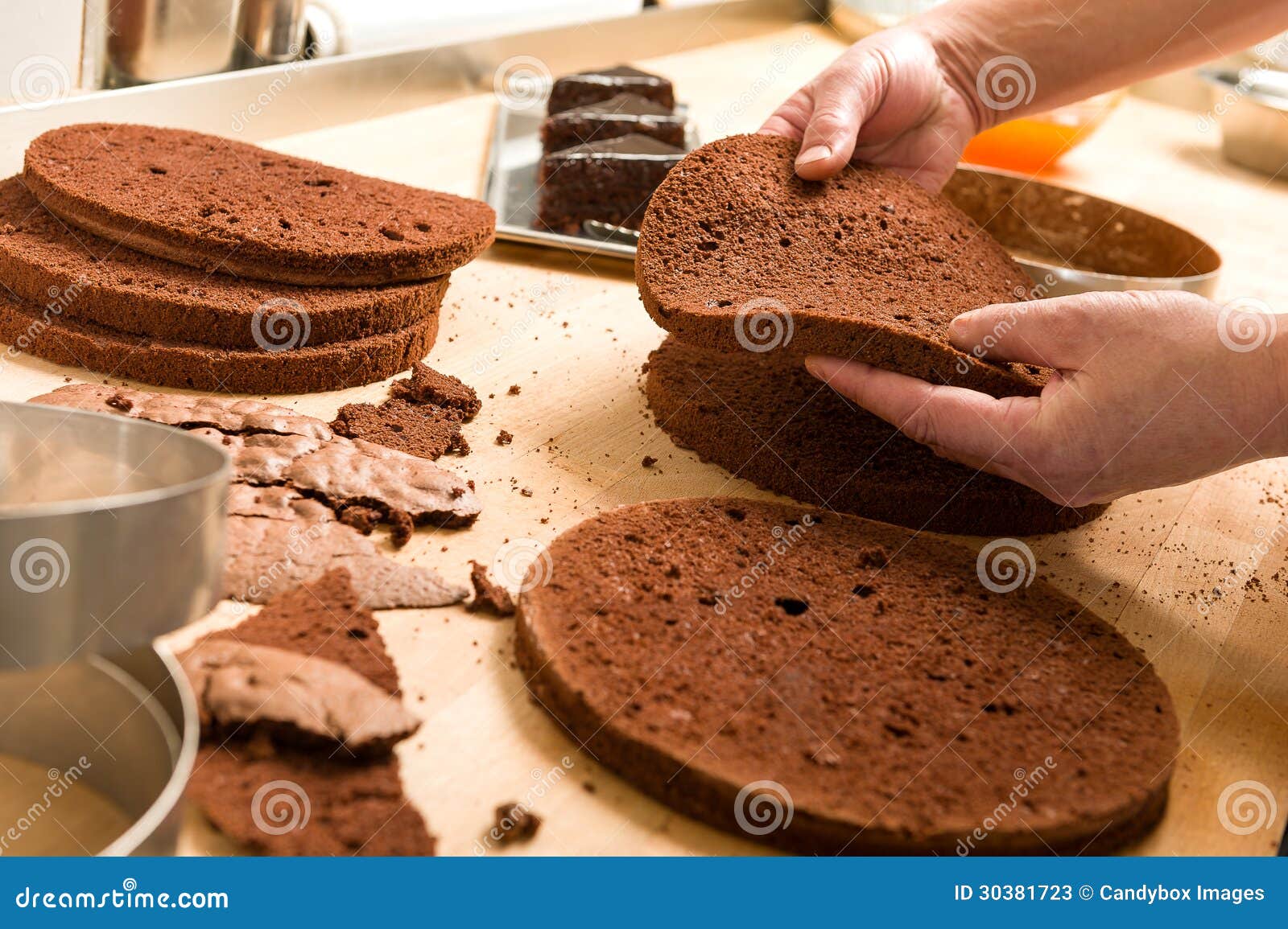 Chef Cutting Cake Layers and Stacking Them Stock Image - Image of ...