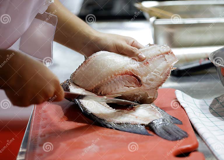 Chef Cutting Fish, Chef Slices Fish Fresh on Board in the Kitchen Stock ...