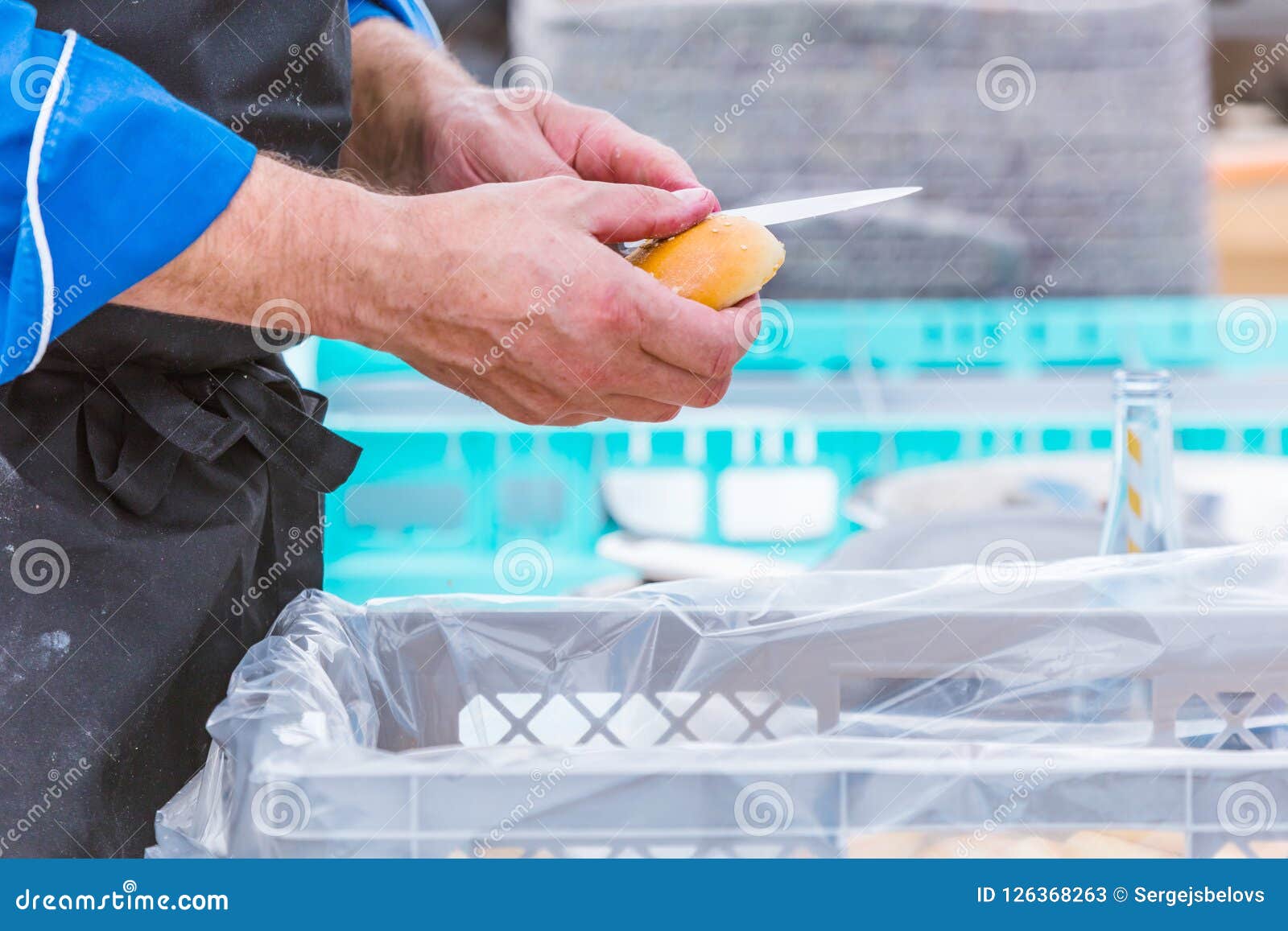 Chef Cutting Fresh Bread for Burger Stock Image - Image of closeup ...