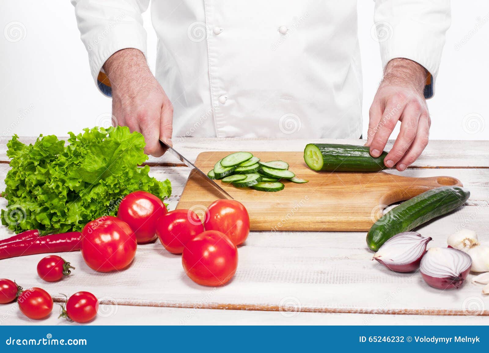 Chef Cutting a Green Cucumber in His Kitchen Stock Photo - Image of ...