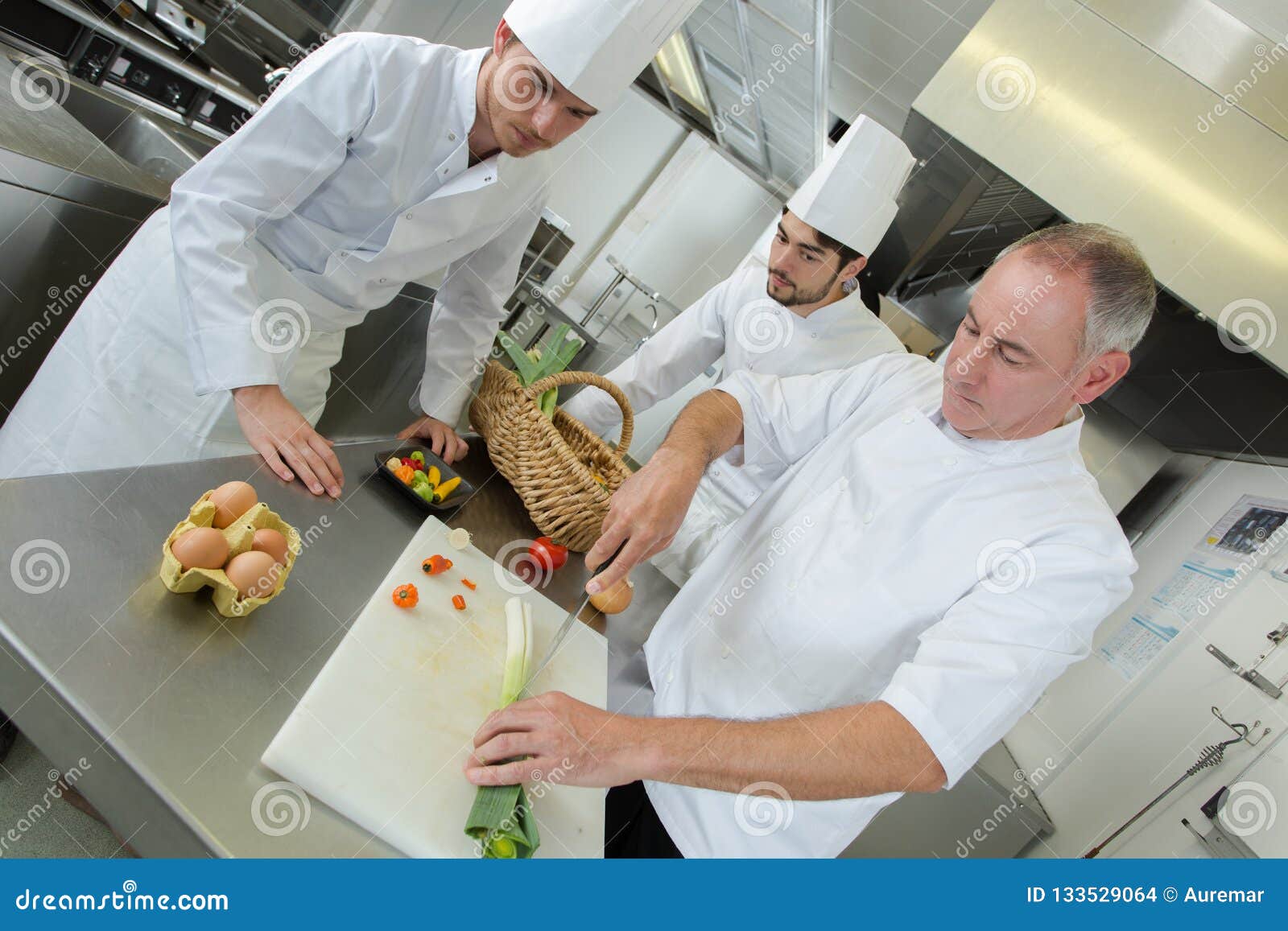 Chef cutting a leak stock photo. Image of restaurant - 133529064