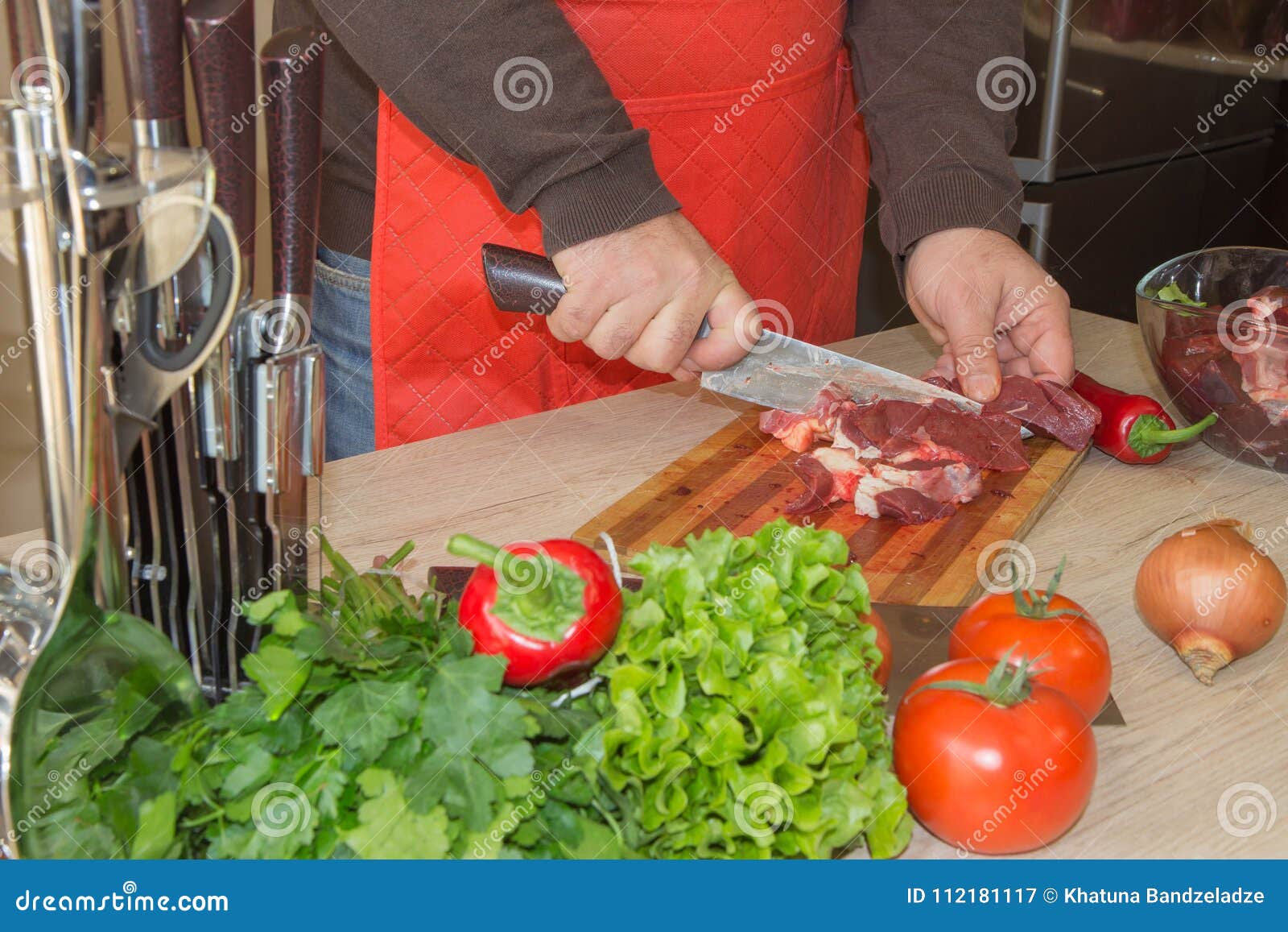 Chef Cutting Meat on Cutting Board. Chef at Work, Kitchen Stock Image ...