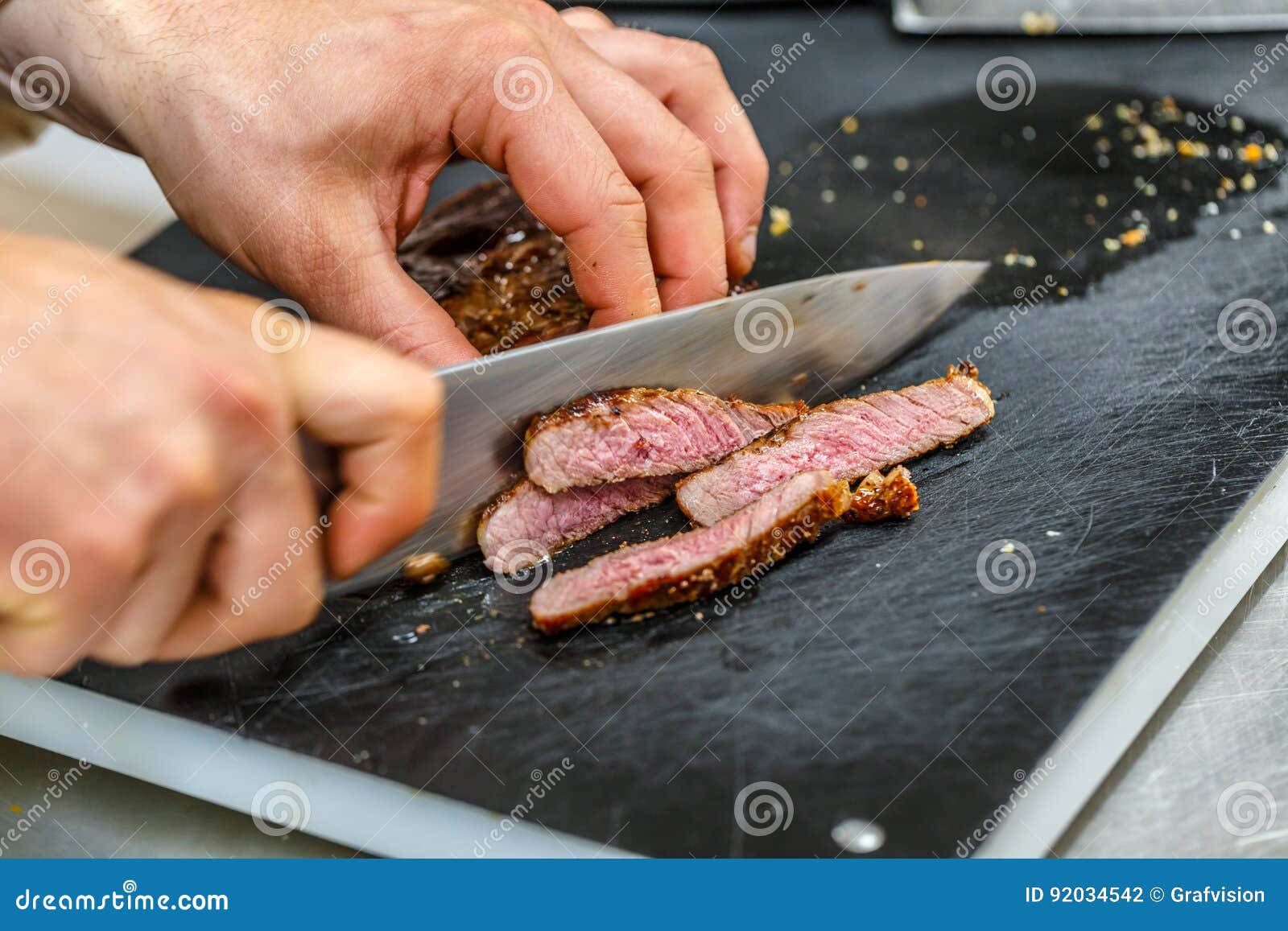 Chef is cutting meat stock photo. Image of prepare, pork - 92034542