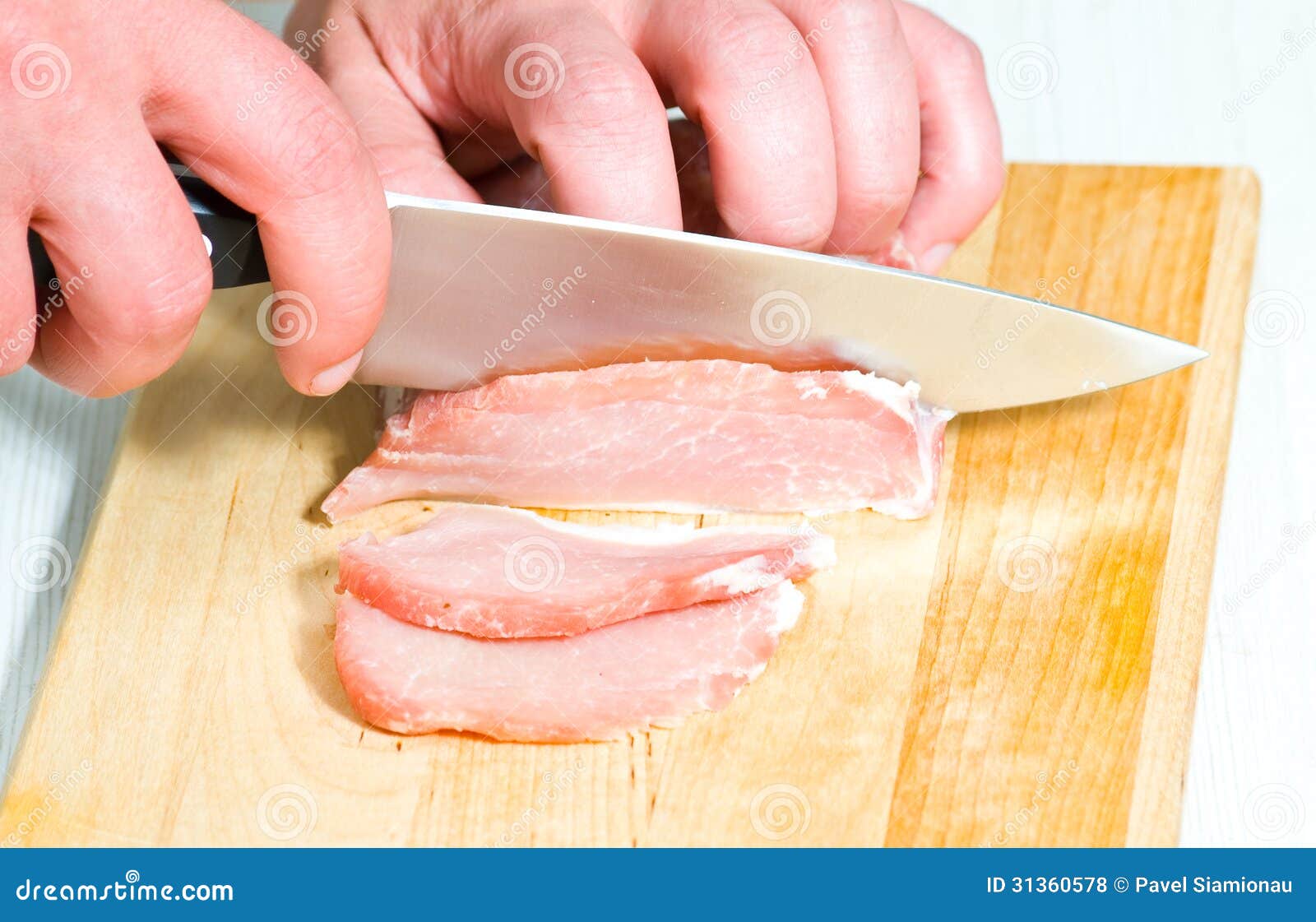 Chef cutting the meat stock photo. Image of prepared - 31360578