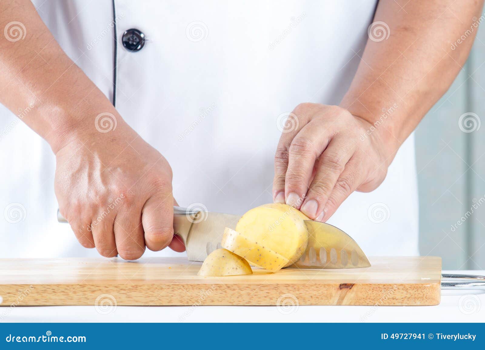 Chef cutting potato stock image. Image of wooden, occupation - 49727941