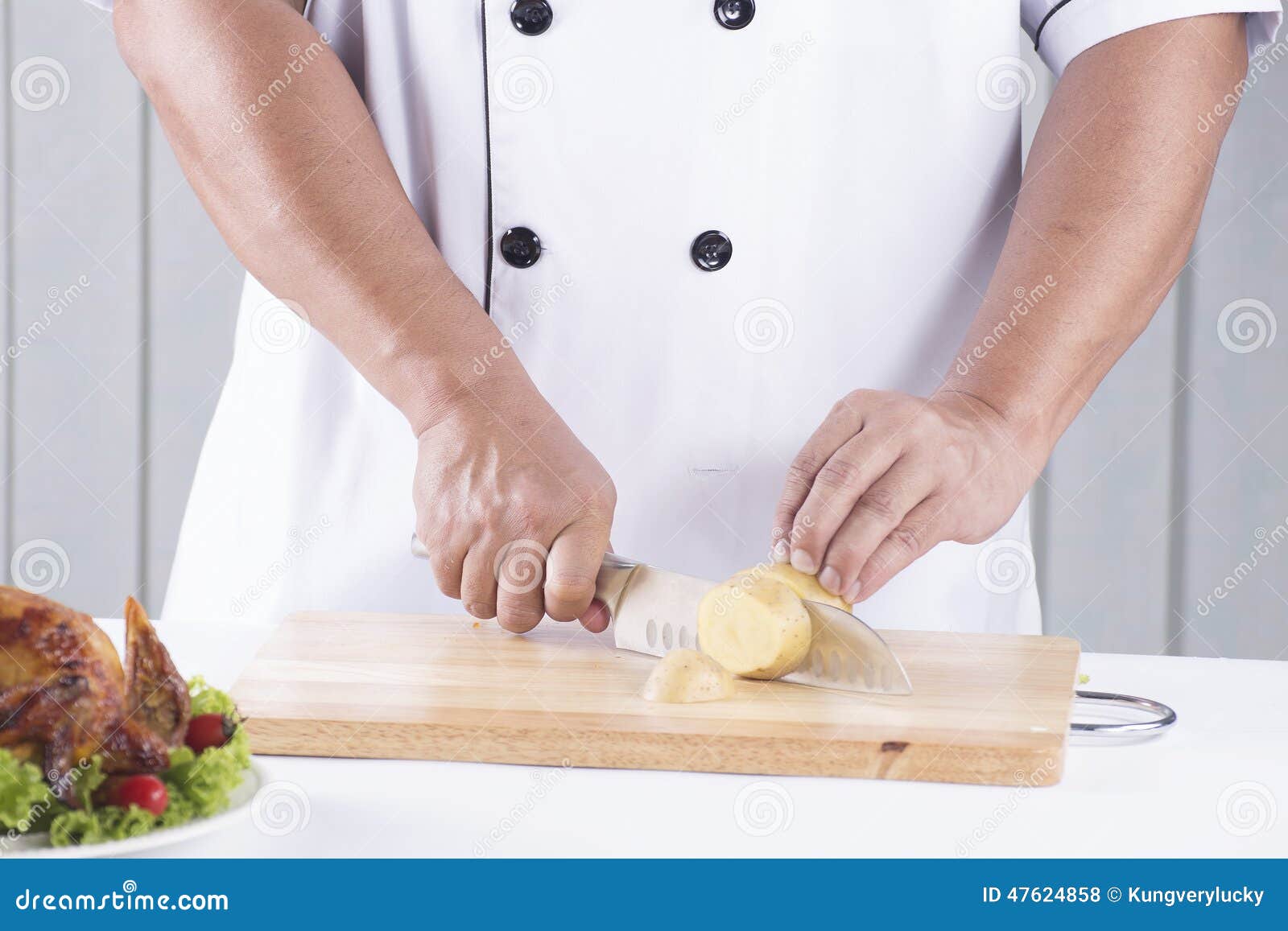 Chef cutting potato stock photo. Image of working, cooking - 47624858
