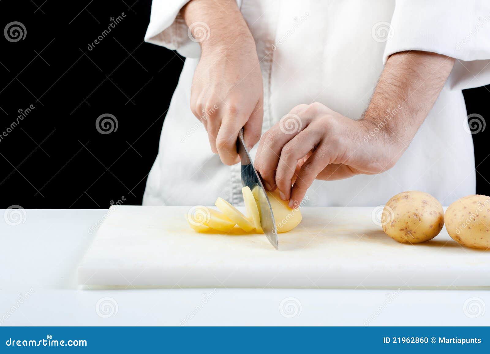 Chef cutting potatoes stock photo. Image of tuber, restaurant - 21962860
