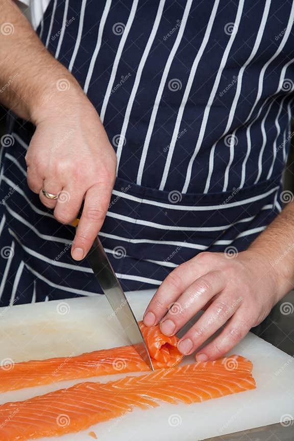 Chef Cutting Salmon Fish on Fillets Stock Image - Image of pieces ...