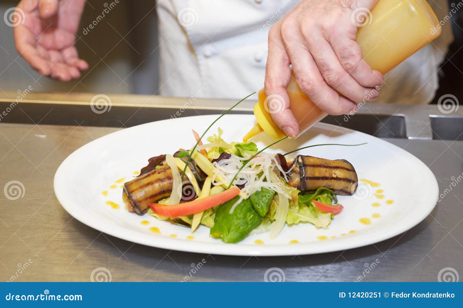 Chef is Decorating Appetizer Dish with Sauce Stock Image - Image of ...