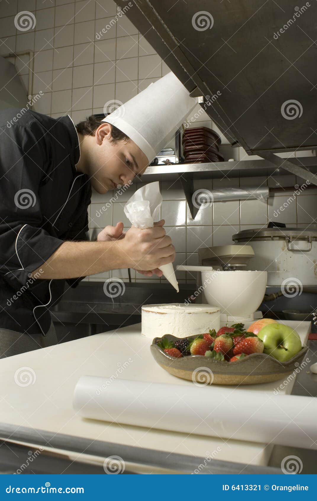 Chef Decorating Cake stock image. Image of fruit, person - 6413321