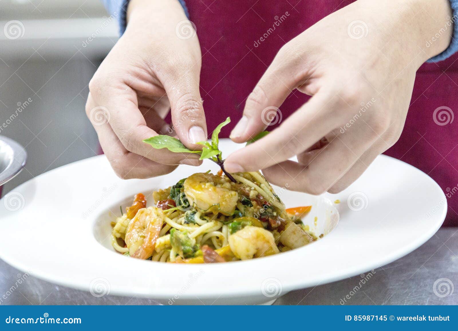 Chef Decorating Meal in Dish in the Kitchen Stock Image - Image of ...
