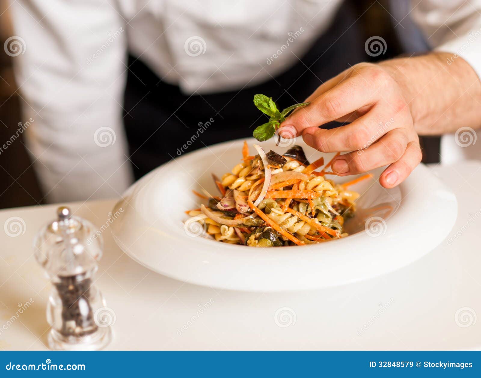Chef Decorating Pasta Salad with Herbal Leaves Stock Image - Image of ...