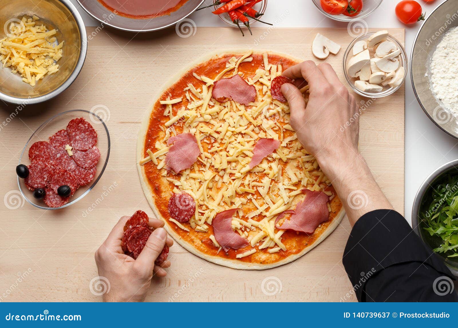 Chef Decorating Pizza with Salami in Restaurant Stock Image - Image of ...