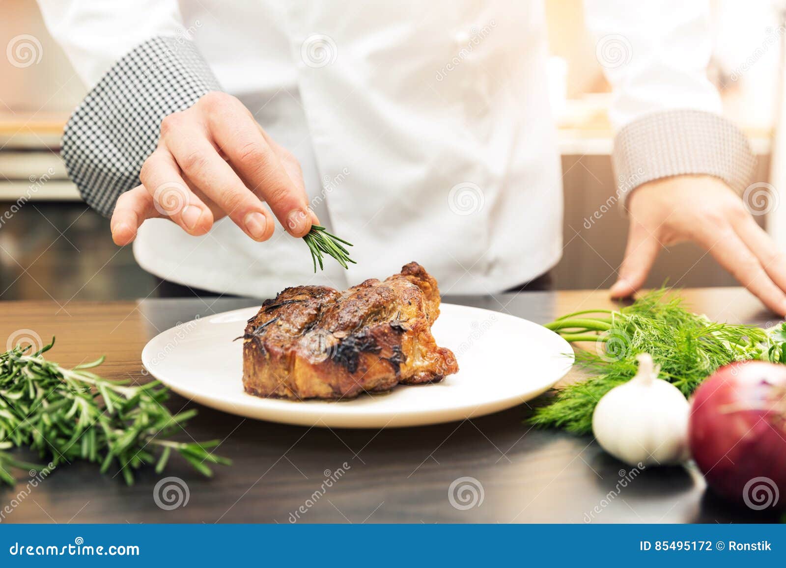 Chef Decorating Roasted Meat with Herbs Stock Photo - Image of people ...