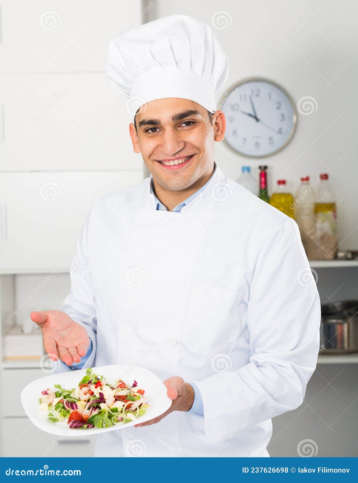 Chef is Demonstrating Presentation of Salad Stock Photo - Image of ...