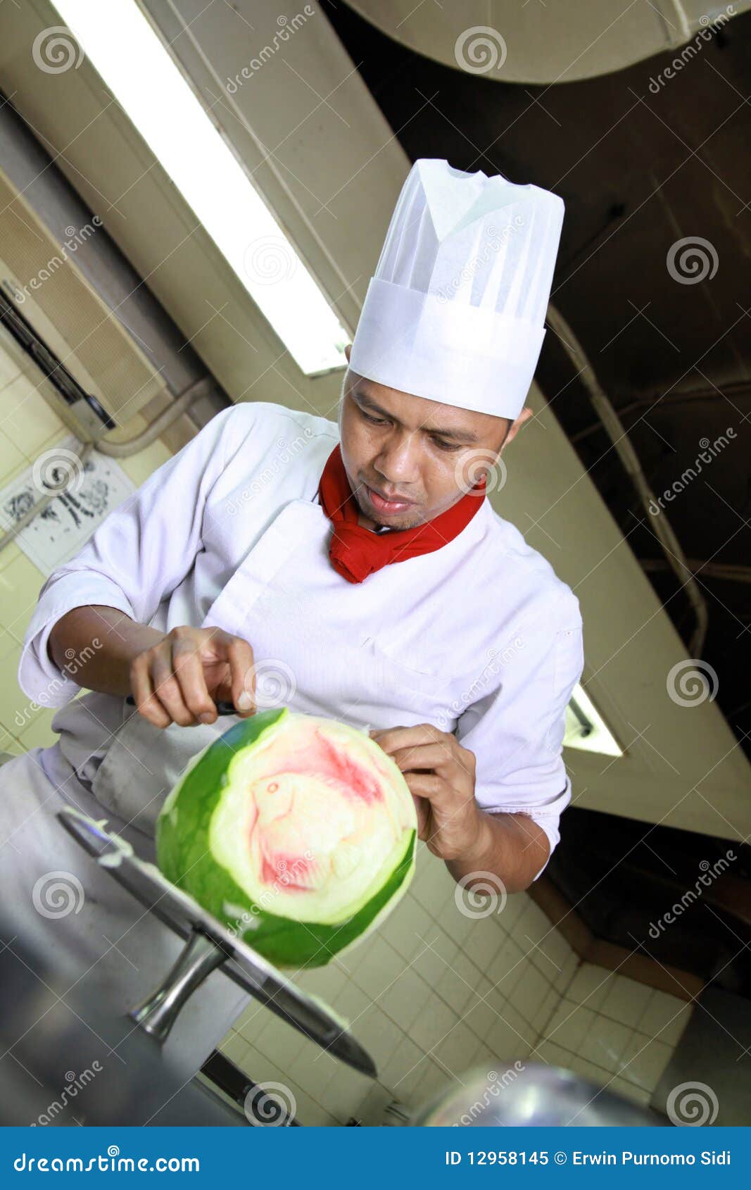 Chef doing carving stock image. Image of restaurant, employee - 12958145