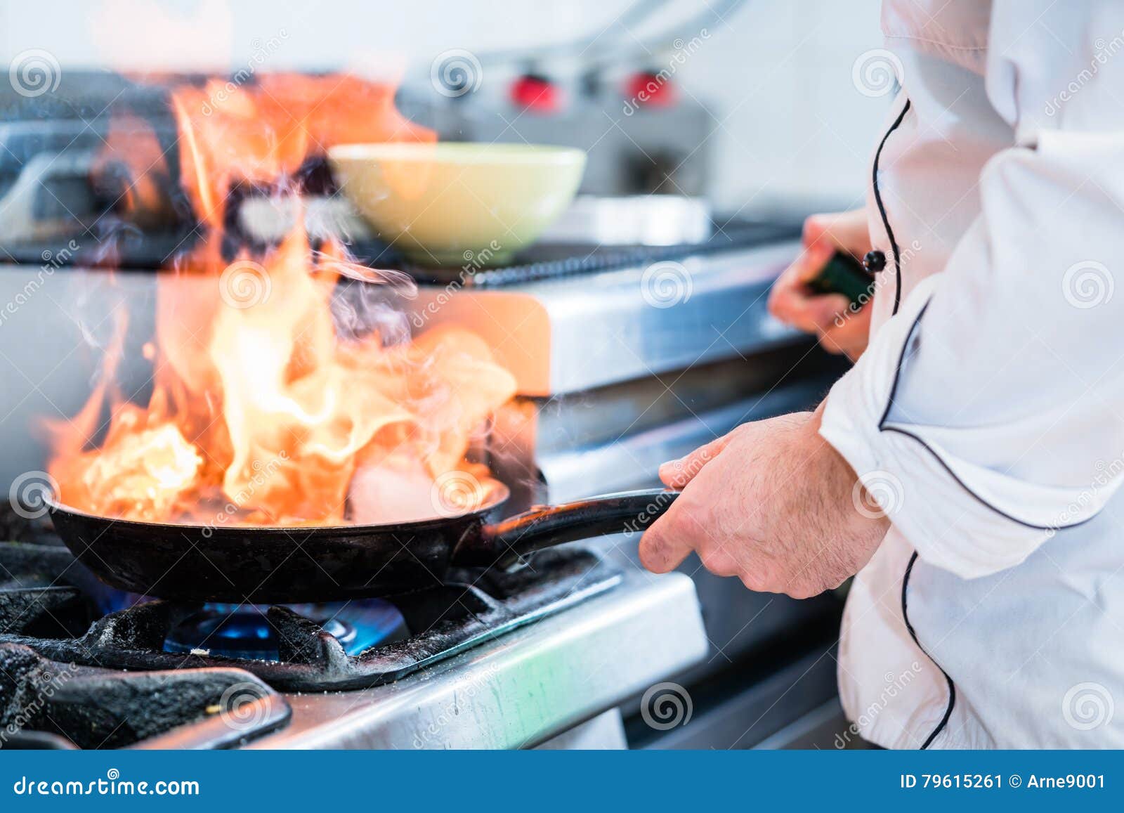 Chef Doing Flambe To Dish in Pan Stock Image - Image of chef ...