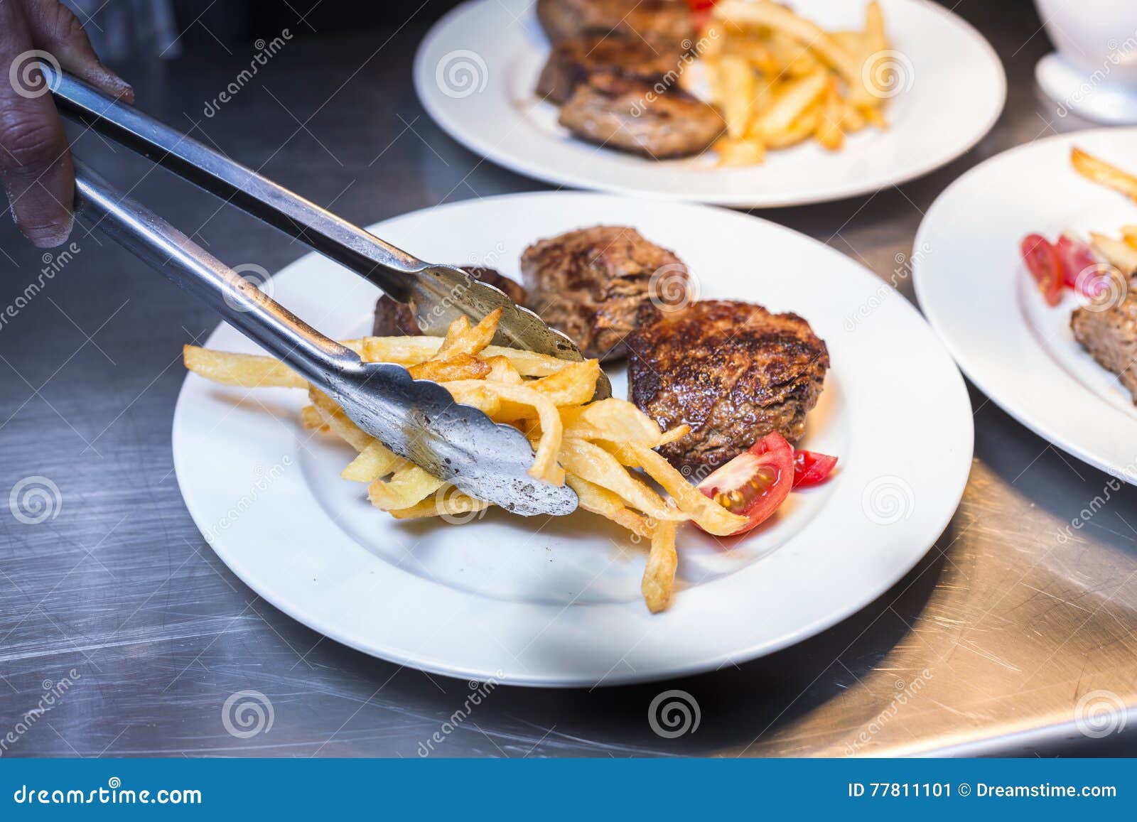 Chef Finishing Her Plate and almost Ready To Serve Stock Image - Image ...
