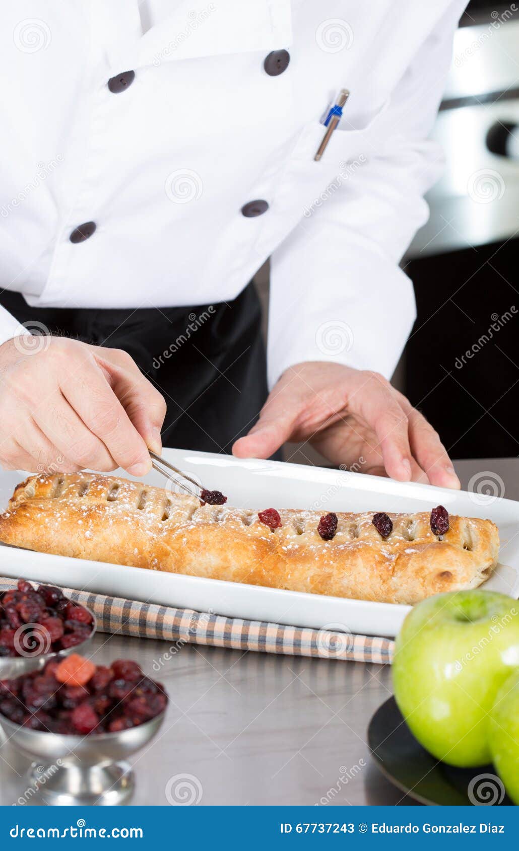 Chef finishing his cake stock image. Image of cake, person - 67737243