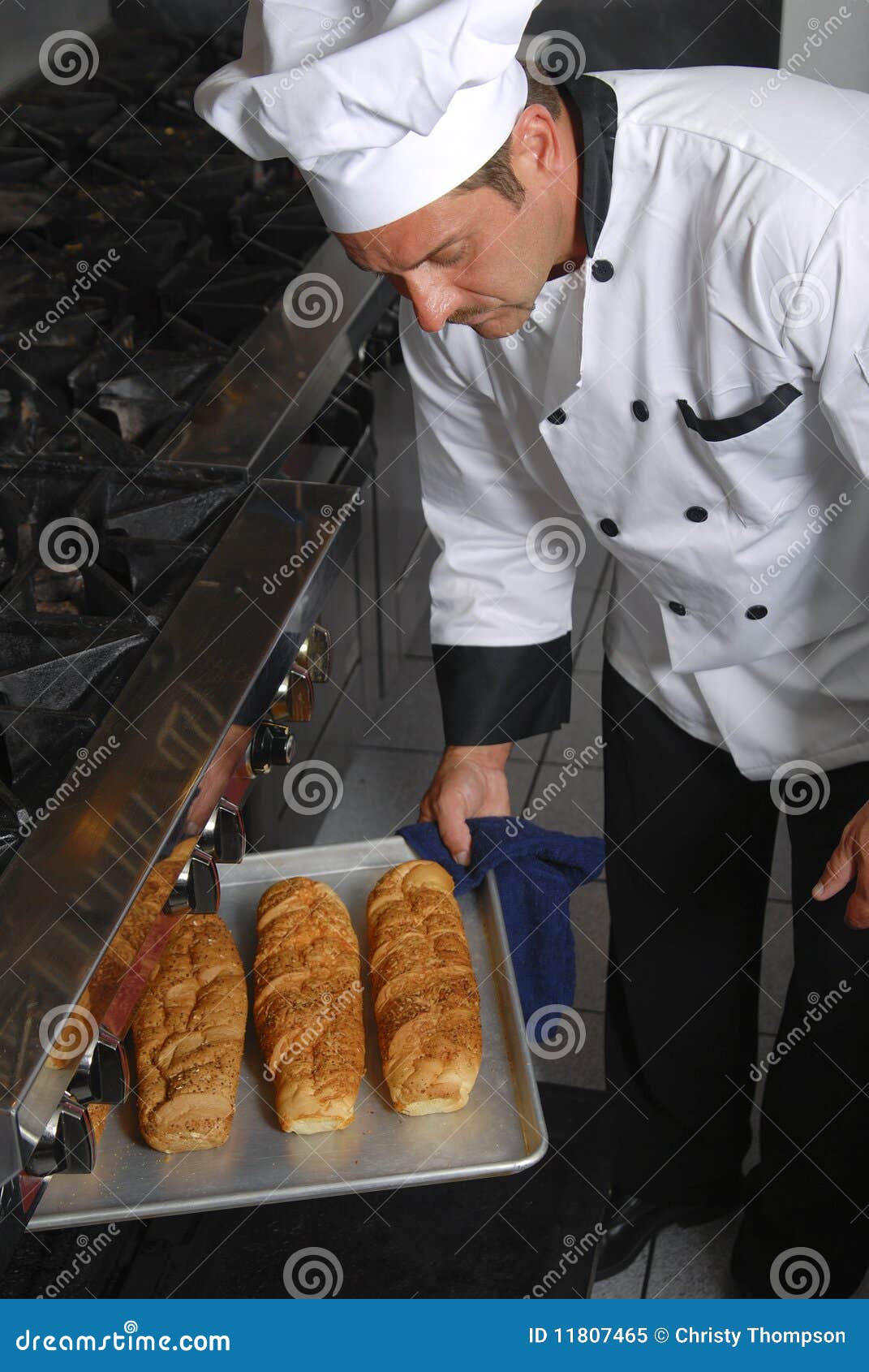 Chef with fresh bread stock image. Image of smiling, loaves - 11807465