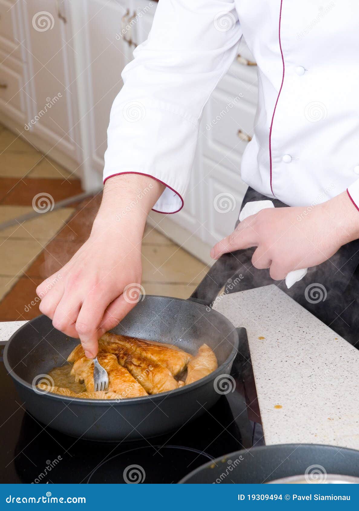 Chef frying chicken fillet stock photo. Image of finger - 19309494