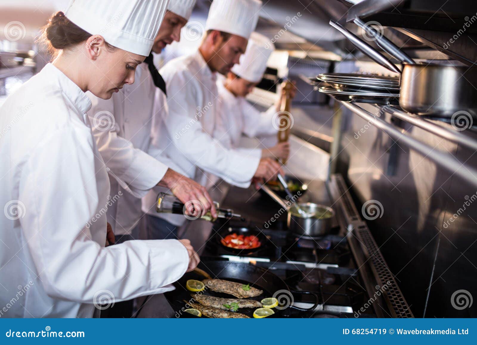 Chef Frying Fish in a Frying Pan Stock Image - Image of focus, lemon ...