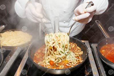 Chef frying mussels stock image. Image of health, cooking - 21586667