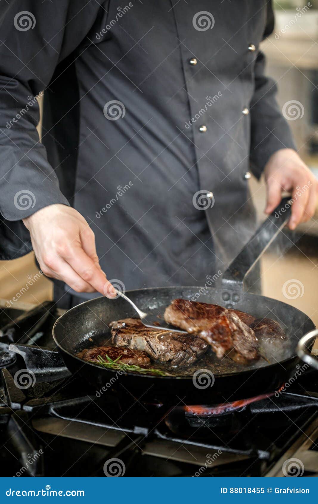 Chef frying pork meat stock image. Image of grilled, meat - 88018455