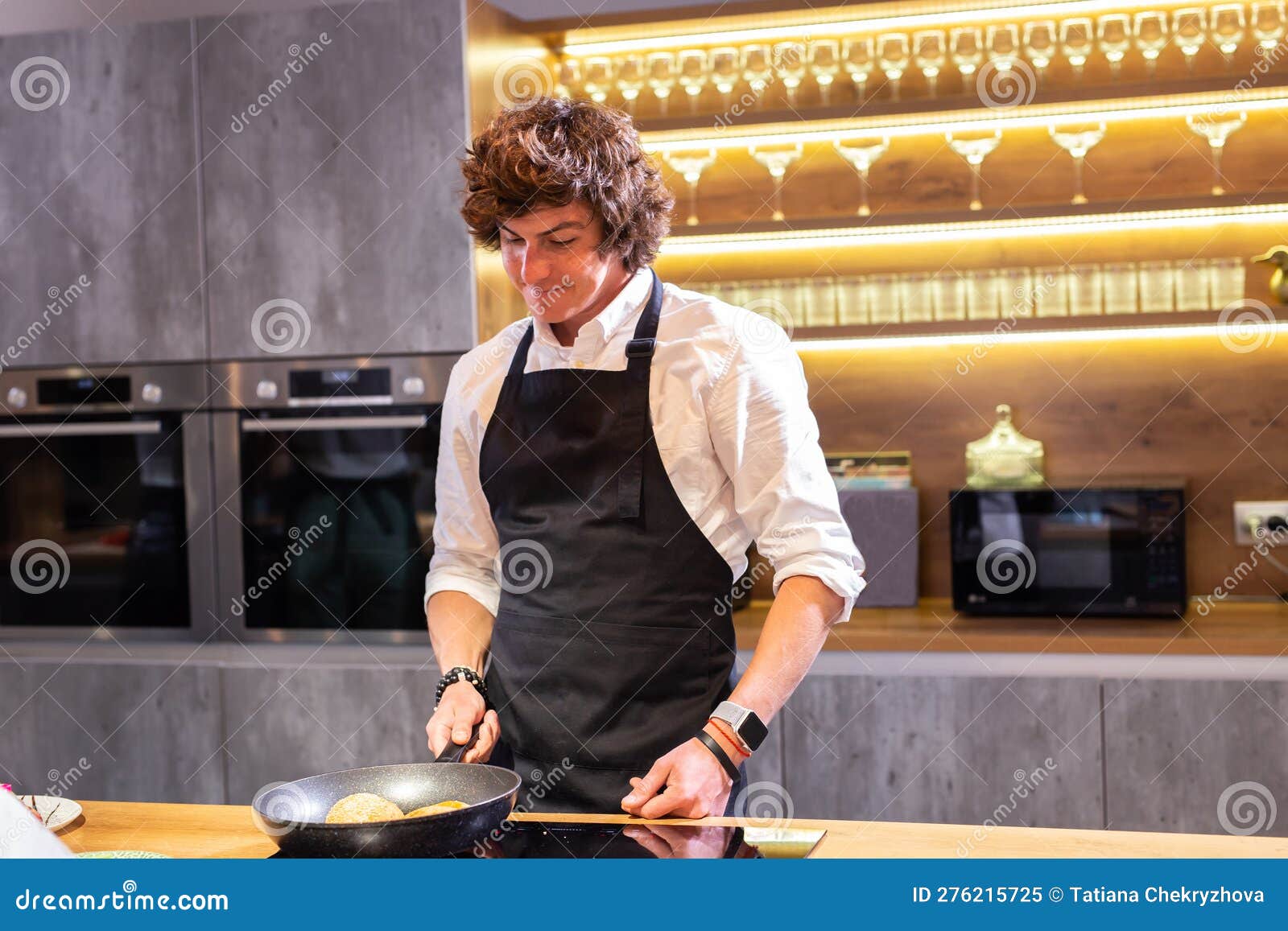 Chef Frying Burger Buns for Dinner Party in the Kitchen Copy Space ...