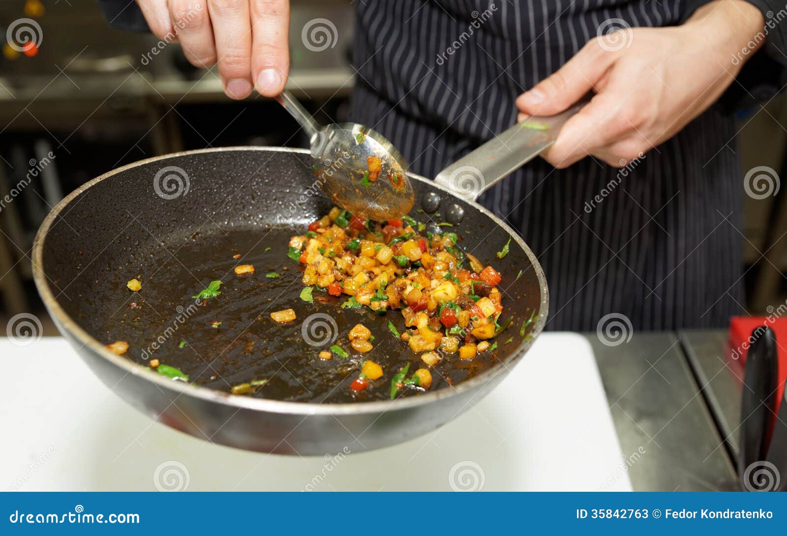 Chef is Frying Vegetables with Herbs Stock Image - Image of ...