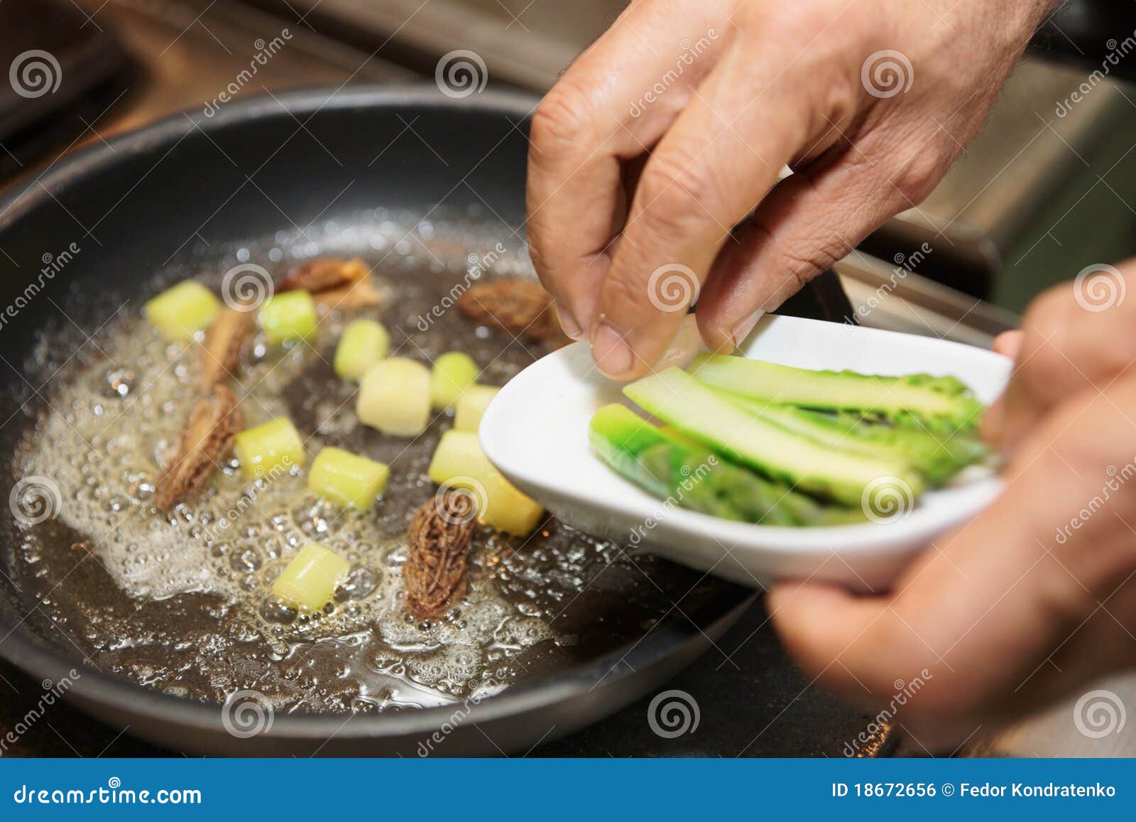 Chef is Frying Vegetables and Morels Stock Photo - Image of butter ...