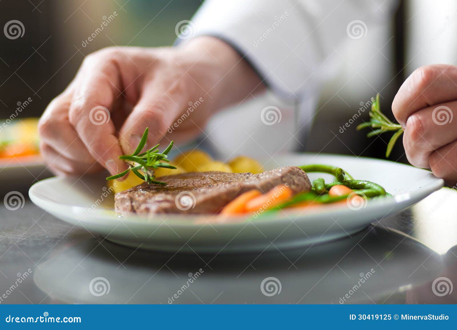 Chef garnishing a dish stock image. Image of meat, cooking - 30419125