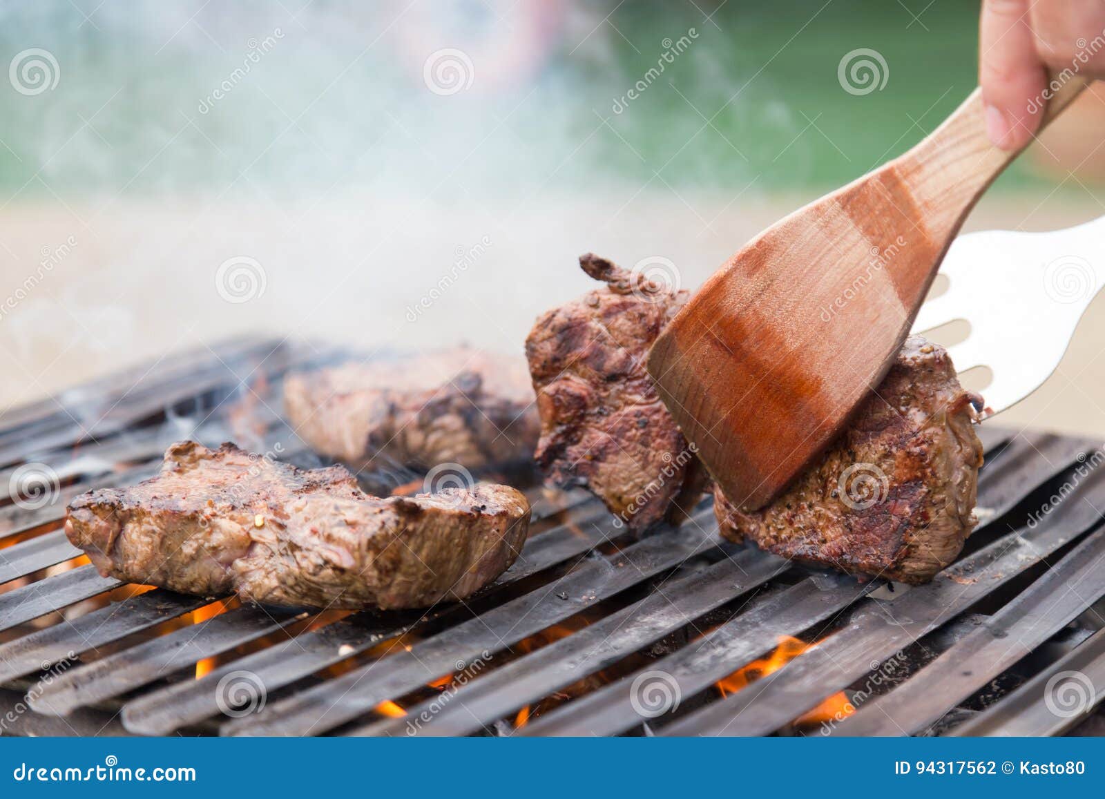 Chef Grilling Beef Steaks on Open Flame BBQ. Stock Photo - Image of ...