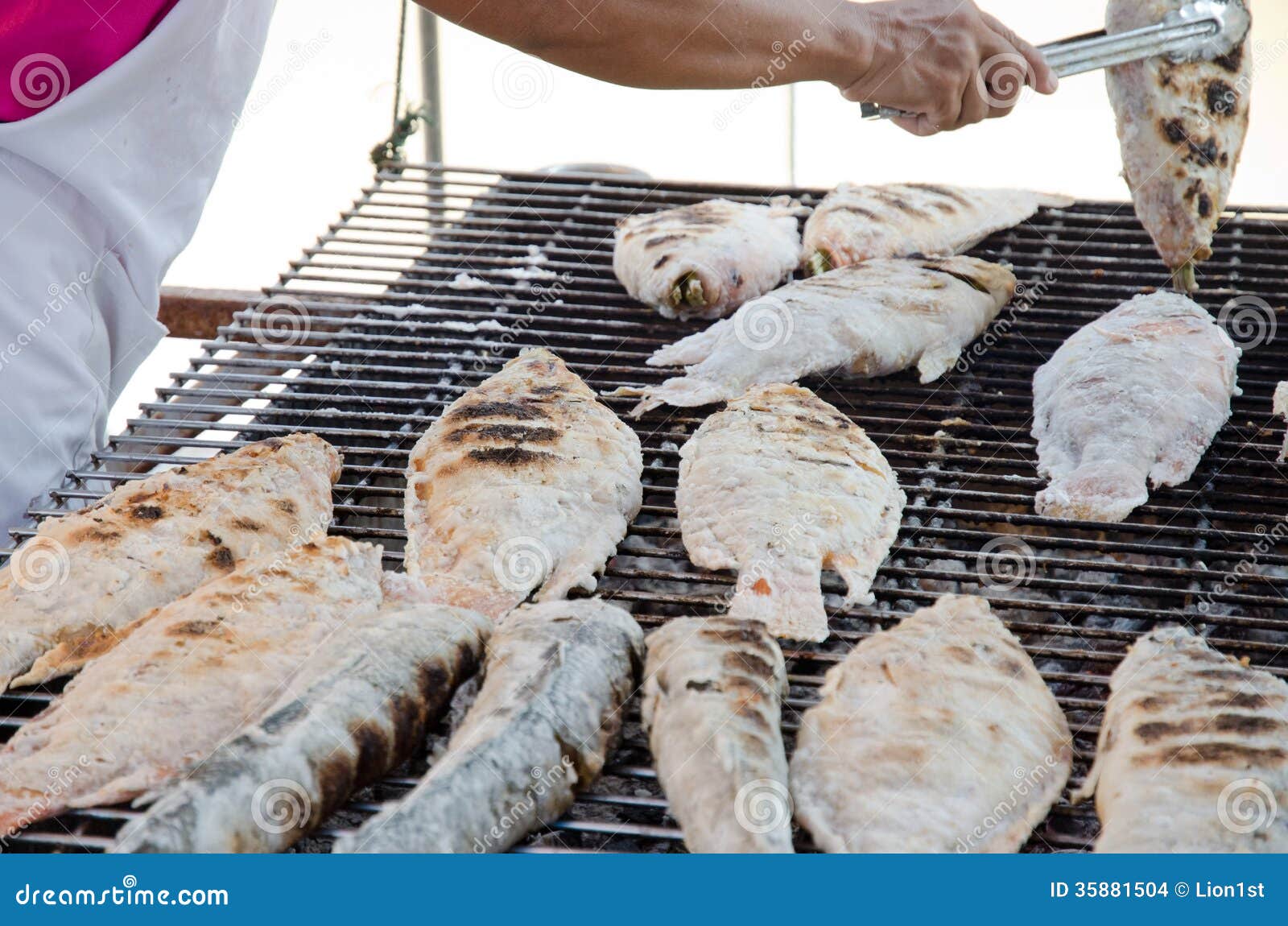 Chef grilling fish stock photo. Image of roasted, restaurant - 35881504