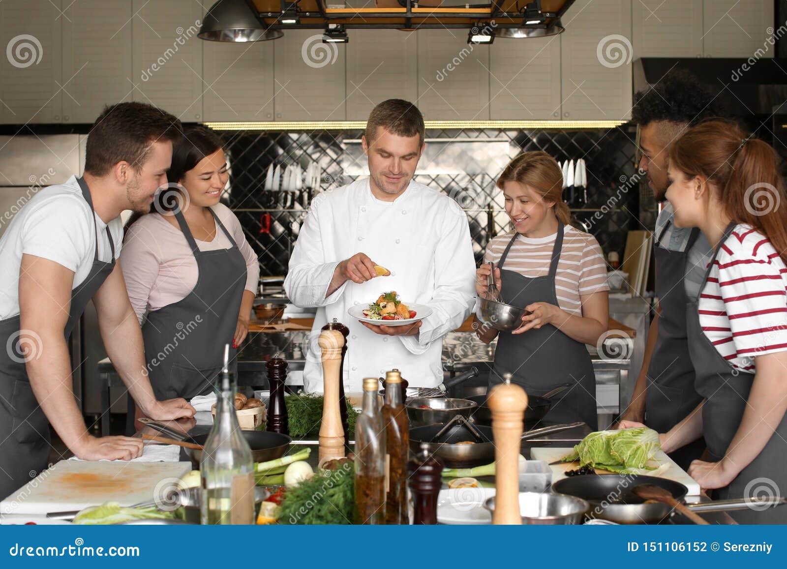 Chef and Group of Young People during Cooking Classes Stock Photo ...