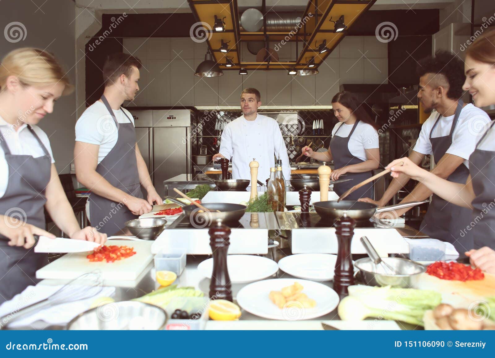 Chef and Group of Young People during Cooking Classes Stock Photo ...