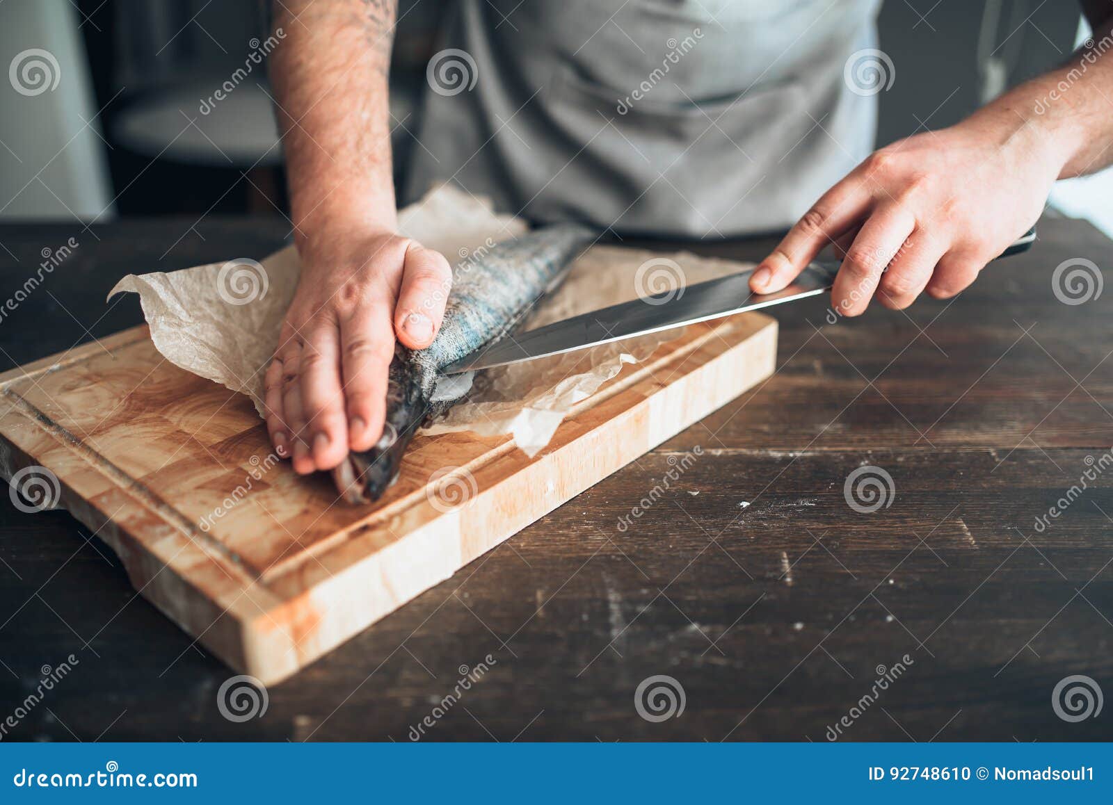 Chef Hands with Knife Cut Up Fish on Cutting Board Stock Photo - Image ...