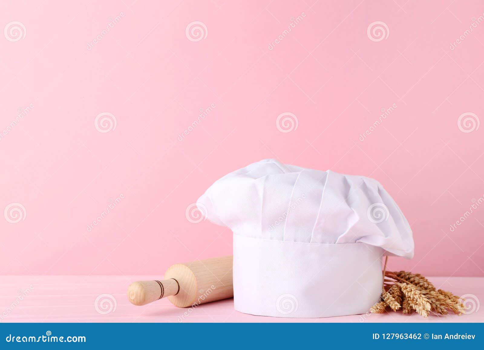 Chef hat with rolling pin stock photo. Image of cose - 127963462