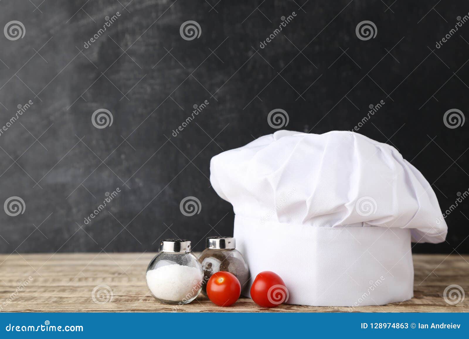 Chef Hat with Salt, Pepper and Tomatoes Stock Image - Image of cooker ...