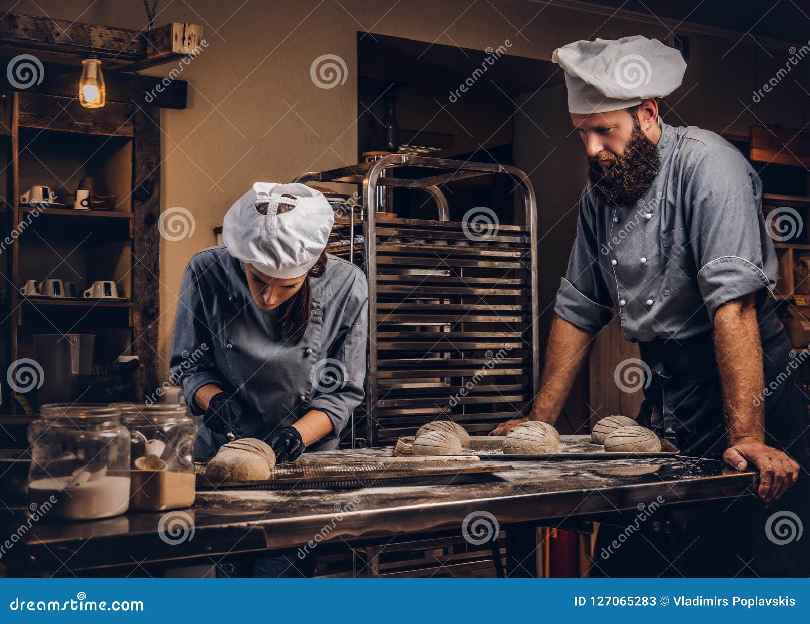 Cooking Master Class in Bakery. Chef with His Assistant Showing Ready ...