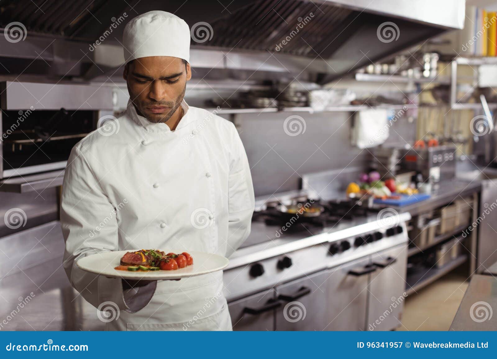 Chef Holding Delicious Dish in Kitchen Stock Image - Image of ...