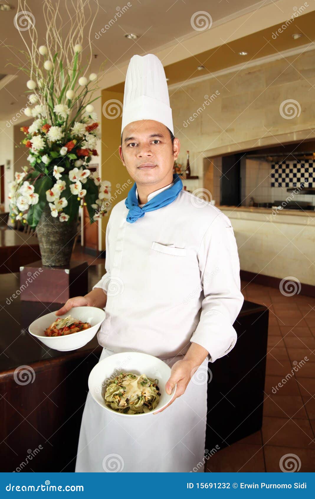 Chef Holding Food at Restaurant Stock Photo - Image of vertical, hotel ...