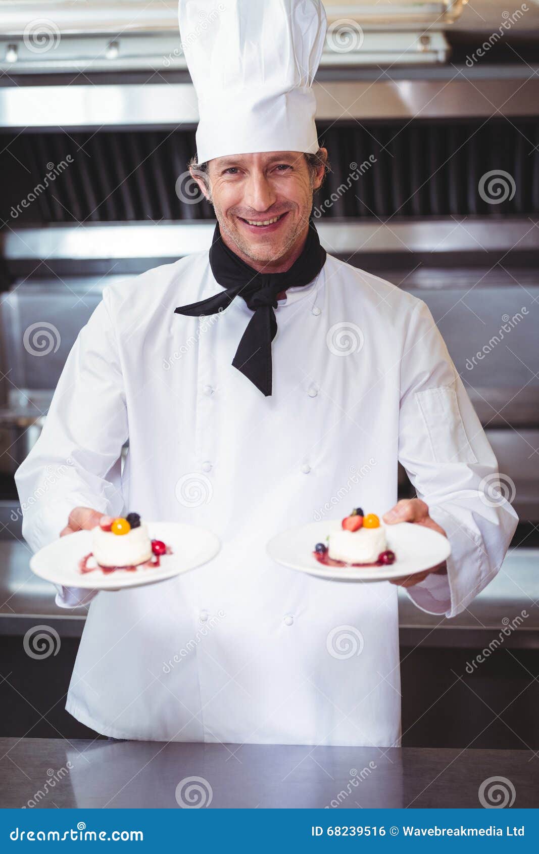 Chef holding his dish stock photo. Image of mature, cook - 68239516
