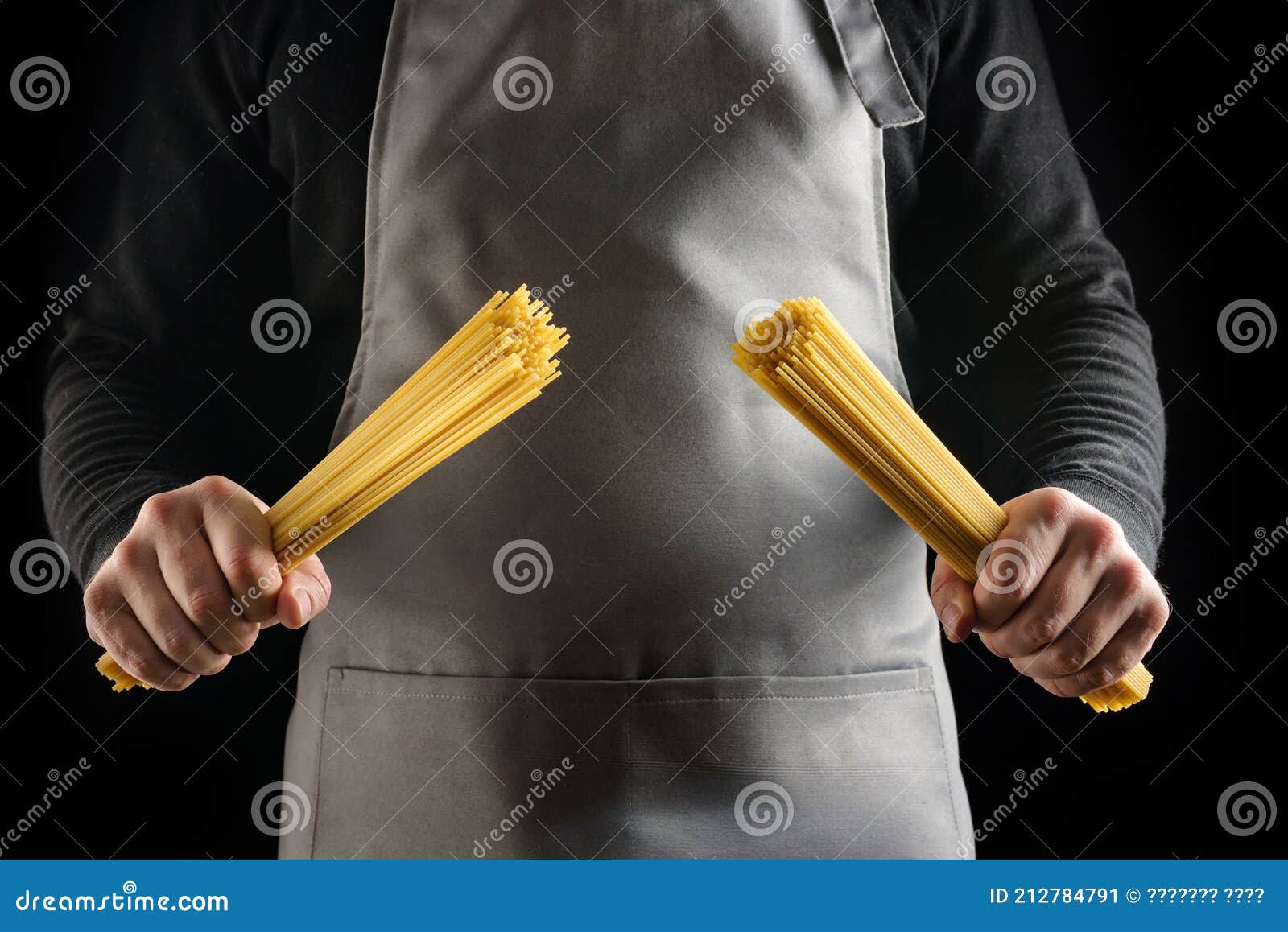 The Chef is Holding Spaghetti Stock Image - Image of eatery, finger ...