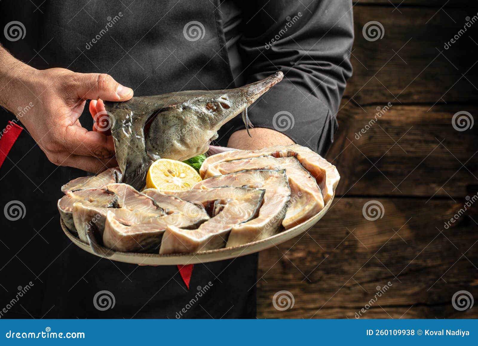 The Chef Holds Steaks of Large Raw Sturgeon Fish. Culinary, Cooking ...
