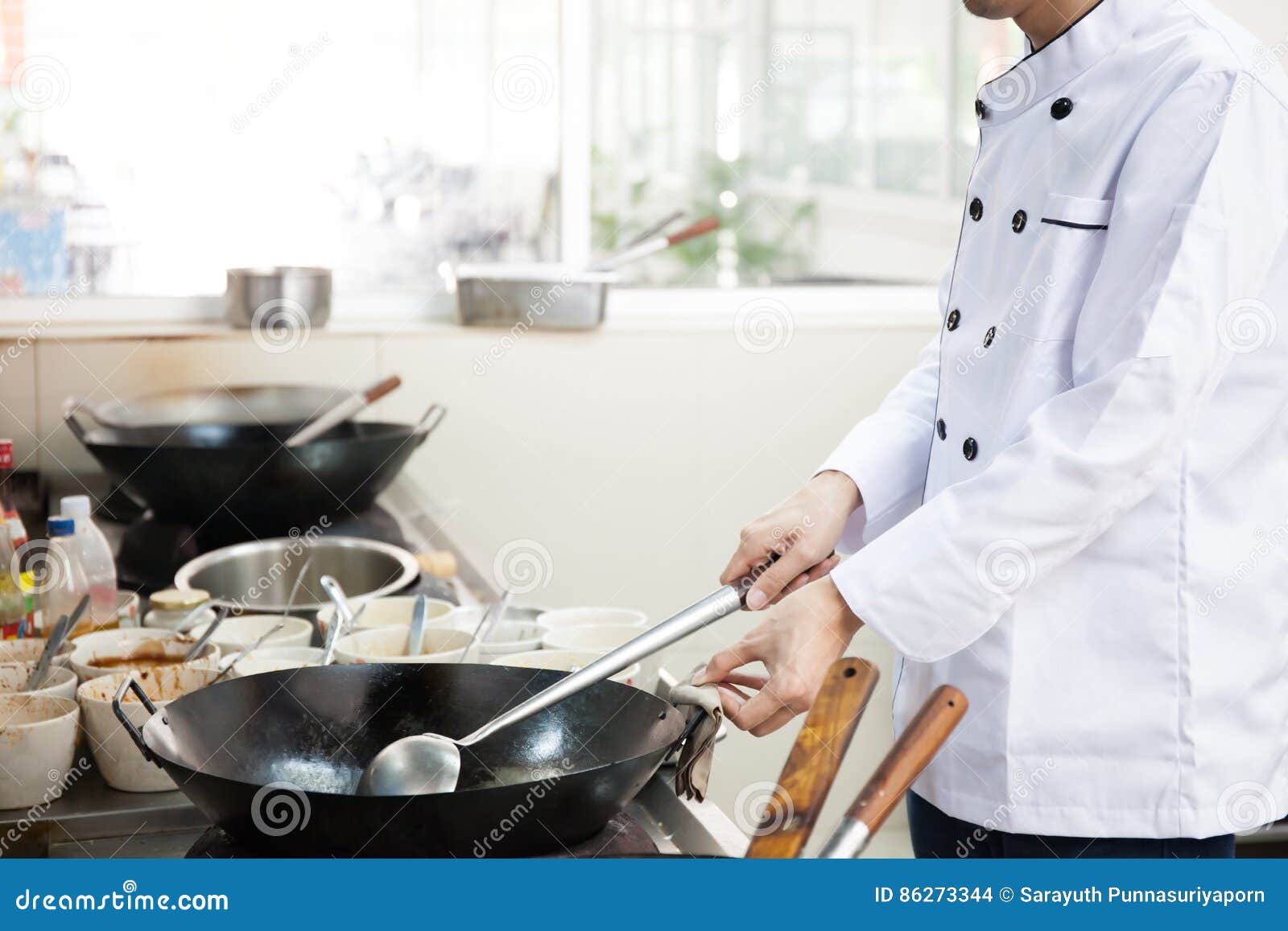 Chef in Hotel or Restaurant Kitchen Busy Cooking Stock Photo - Image of ...