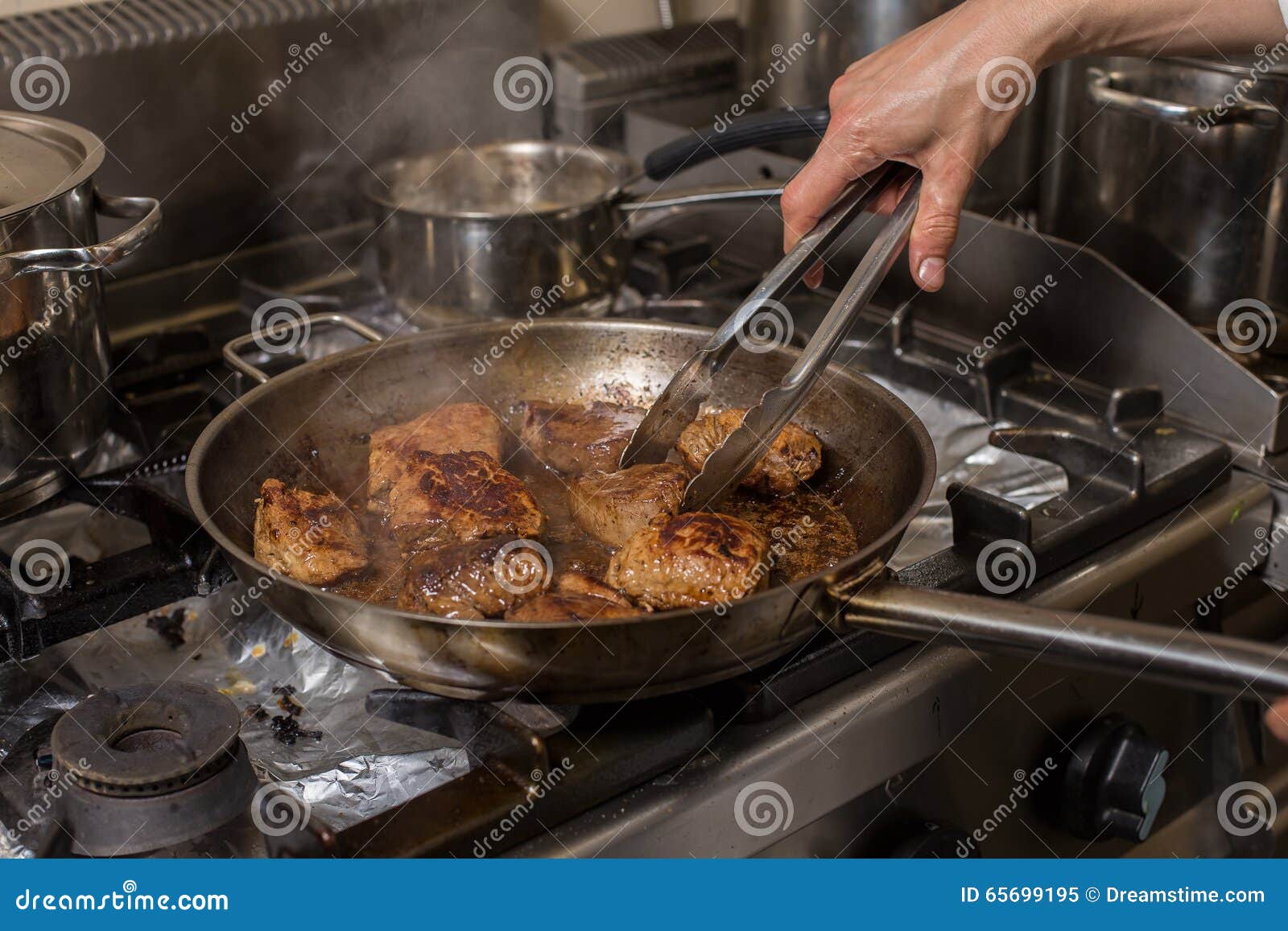 Chef in Hotel or Restaurant Kitchen Cooking, only Hands Stock Image ...