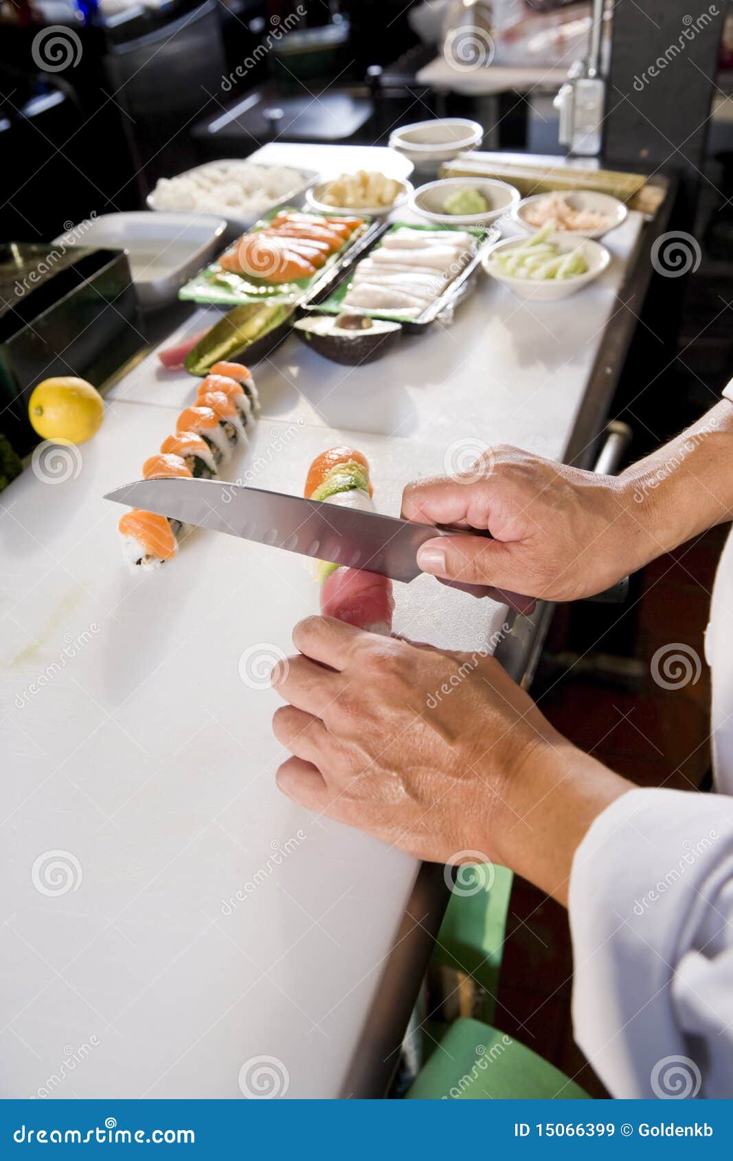 Chef in Japanese Restaurant Preparing Sushi Rolls Stock Image - Image ...