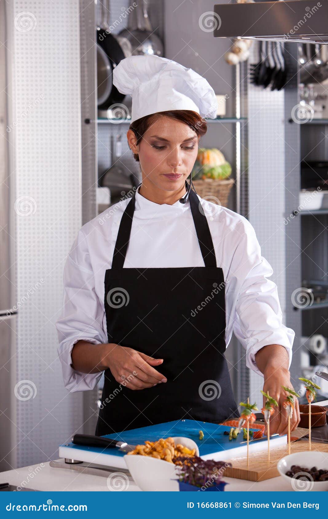 Chef in the kitchen stock image. Image of woman, uniform - 16668861
